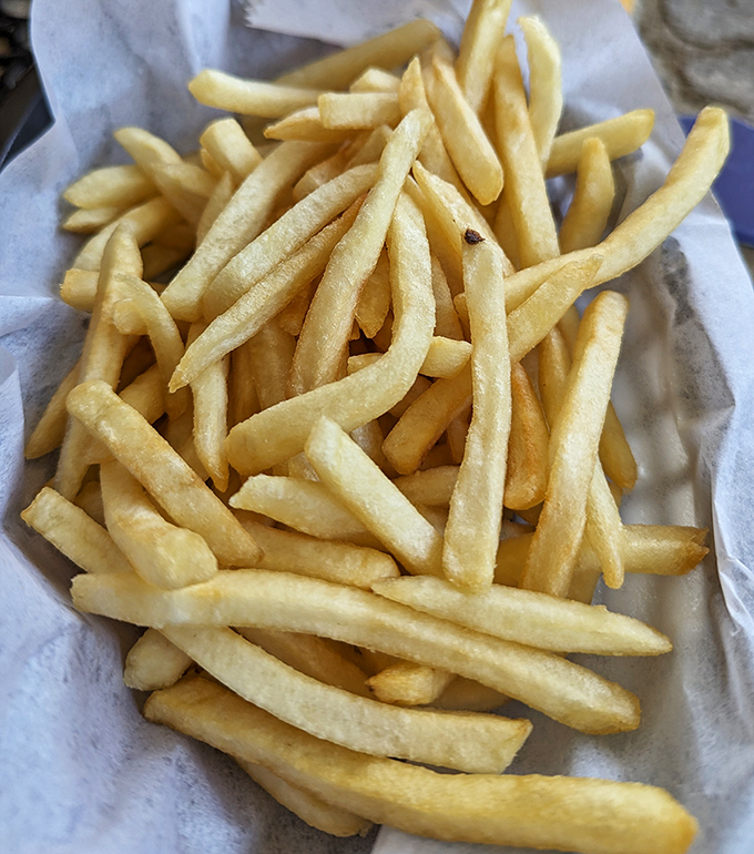 French fries that achieve the golden ratio of crispy exterior to fluffy interior. These aren't sides&mdash;they're co-stars.