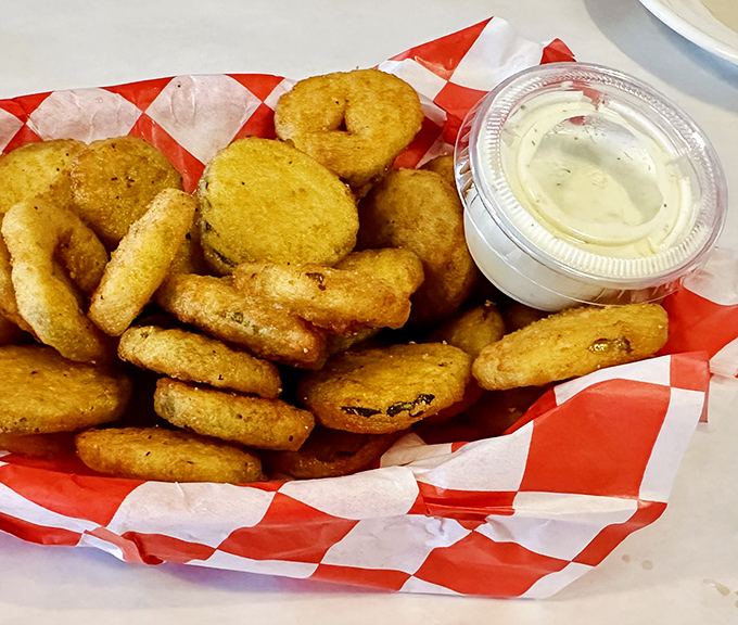 Fried pickles &ndash; the unexpected diner delight that converts skeptics into evangelists. Crispy, tangy perfection with a side of ranch.
