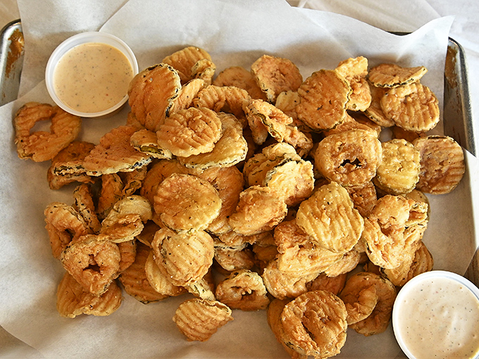 These fried pickles aren't just appetizers&mdash;they're conversation starters, served with a dipping sauce that makes you wonder why you'd eat pickles any other way.