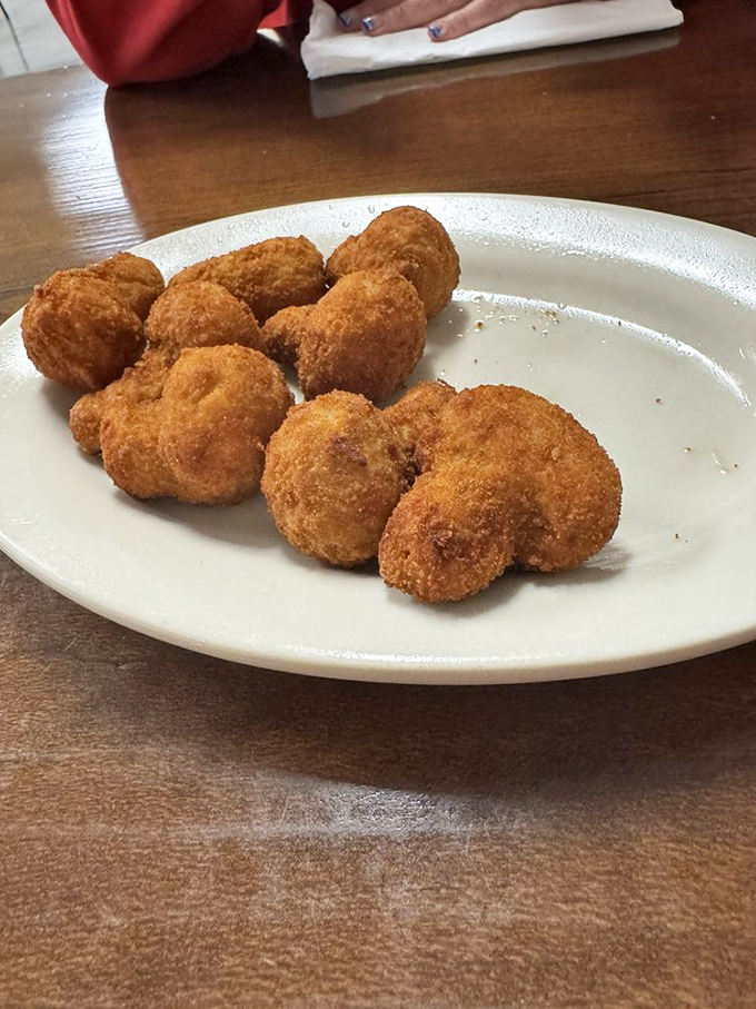These aren't just fried mushrooms; they're little umami bombs waiting to explode with earthy goodness in every crispy, golden bite.