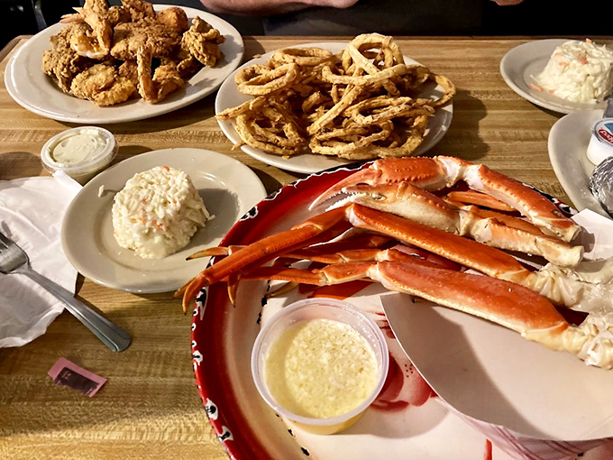 Fried oysters and snow crab sharing a plate like old friends catching up over coffee.