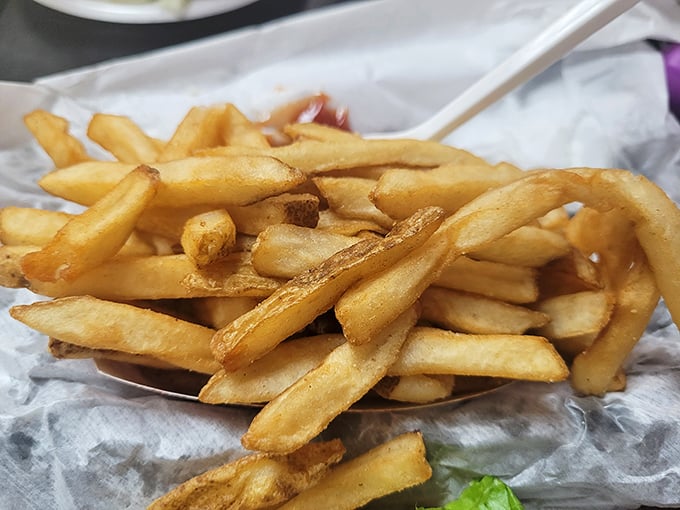 These aren't just fries; they're golden happiness sticks, cooked to that perfect spot between crispy exterior and fluffy interior.