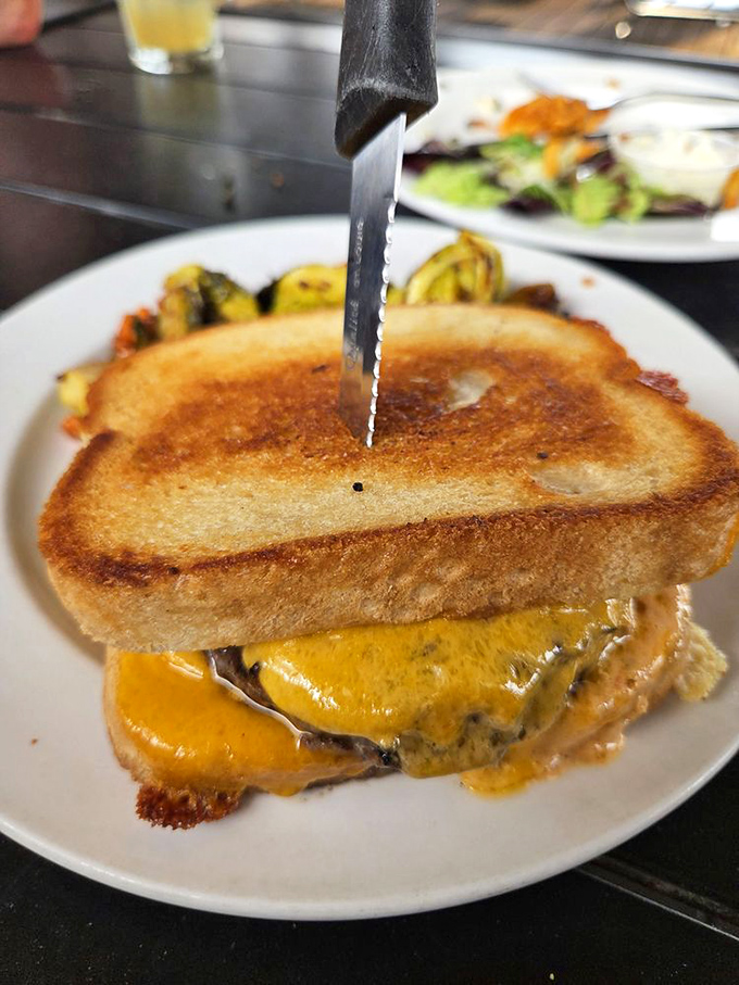 This grilled cheese sandwich has clearly been working out&mdash;bulging with melted cheddar and attitude, it's comfort food with ambition.