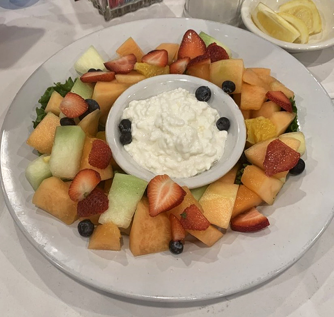 This fruit platter with cottage cheese center isn't just breakfast&mdash;it's edible art that somehow makes healthy eating feel like cheating.