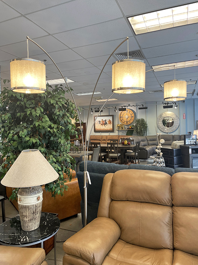 Arc lamps cast a warm glow over furniture displays where you can test-drive that leather recliner and imagine it in your living room at a fraction of department store prices.