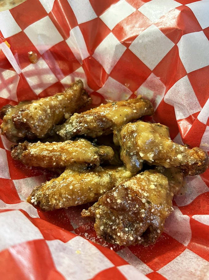 These garlic parmesan wings glisten with buttery goodness, promising a flavor that lingers in your memory long after the meal ends.
