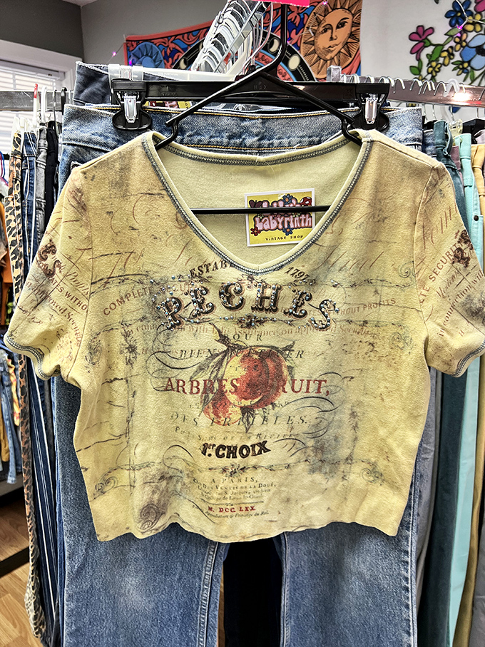 History and fashion collide on this vintage-inspired "Peches" tee. French flair without the airfare!