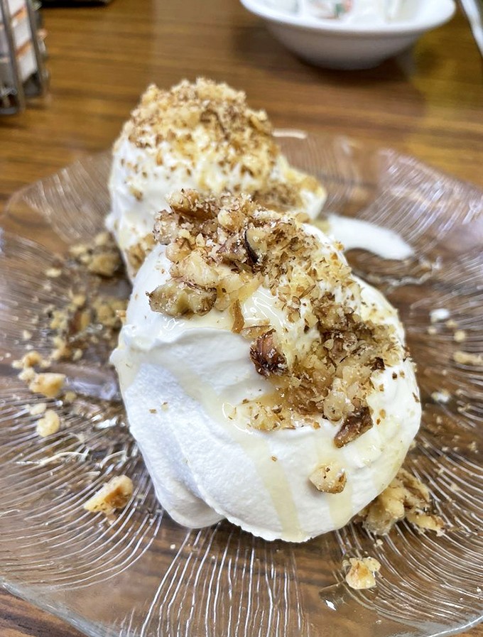 Greek yogurt elevated to art form. Those honey-drizzled walnuts aren't just toppings&mdash;they're the crown jewels of breakfast nobility.