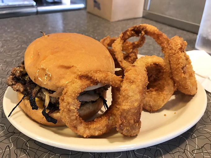 When a burger meets onion rings, it's not just a meal&mdash;it's a relationship worth committing to. Till the last bite do you part.