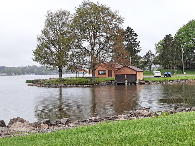 Golden hour transforms the lake into liquid amber, making everyone look like a professional photographer.
