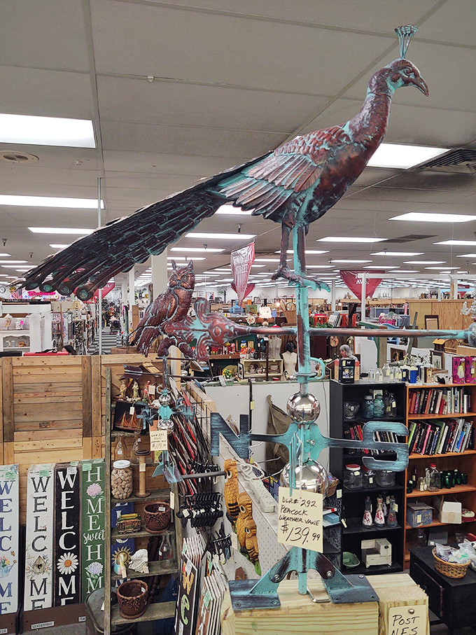 This copper peacock weathervane stands majestically above the crowd, like a metallic sentinel guarding treasures from another era.