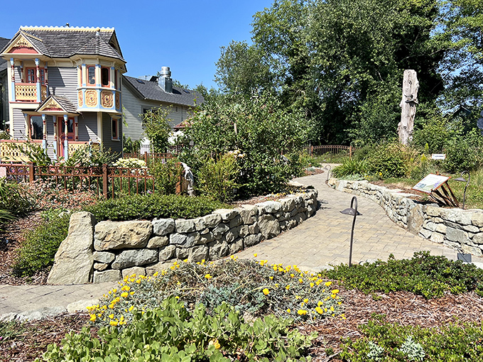 Garden pathways wind through stone walls and native plantings, creating pocket-sized sanctuaries that feel miles away from everyday concerns.