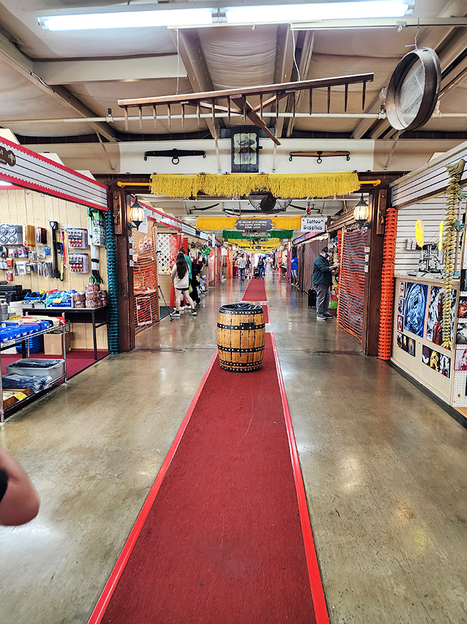 The red carpet treatment isn't just for Hollywood&mdash;at Traders World, it guides shoppers through corridors of possibility, with a rustic barrel marking the way.