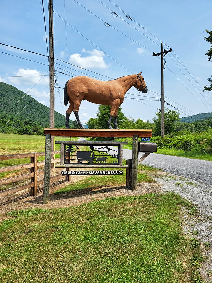 This equine sentinel stands guard at the entrance, a wooden tribute to the four-legged engines that powered America's westward expansion.