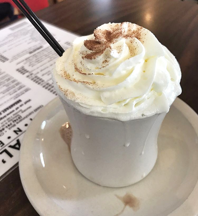 Hot chocolate that wears its whipped cream crown with pride. This isn't just a beverage—it's liquid comfort with a royal topping.