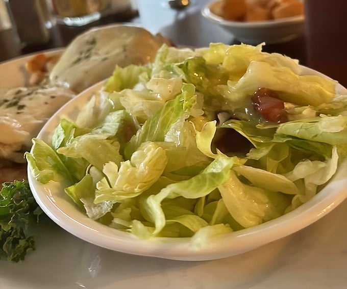 A simple salad elevated to art form with what appears to be the legendary hot bacon dressing&mdash;proof that Pennsylvania Dutch cooks knew vegetables needed persuasion to shine.