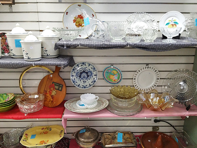 Glassware that tells stories of dinner parties past. One person's retired entertaining set becomes another's vintage collection—circle of retail life.