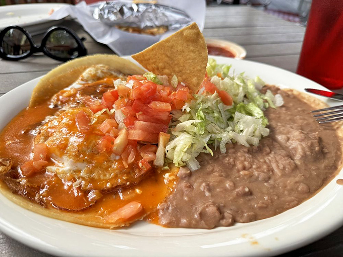 Huevos rancheros: breakfast that makes you question why we ever settled for cereal. That tortilla looks hand-pressed to perfection.