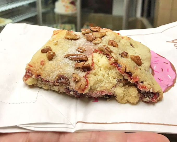 This berry-studded scone with perfectly placed pecans isn't just breakfast&mdash;it's edible architecture that happens to pair perfectly with coffee.