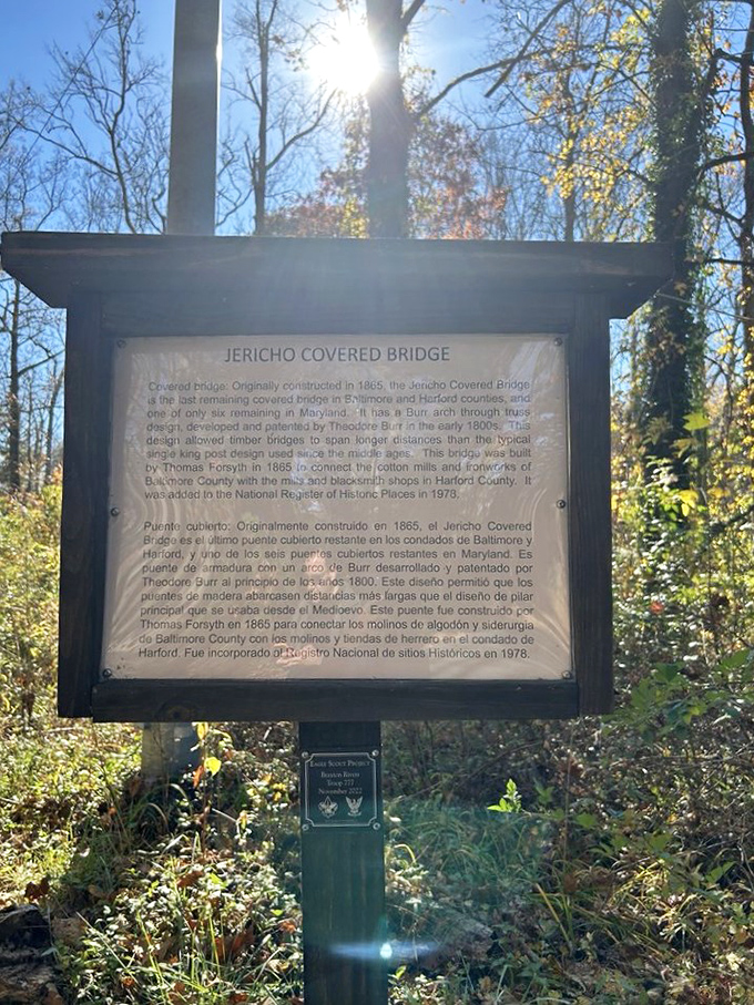 This weathered sign tells the bridge's story in two languages, proving that architectural marvels need no translation.