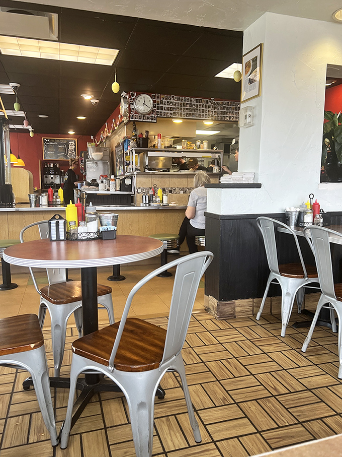 Where breakfast magic happens. The industrial-chic chairs and wooden tables create the perfect stage for morning feasting rituals.