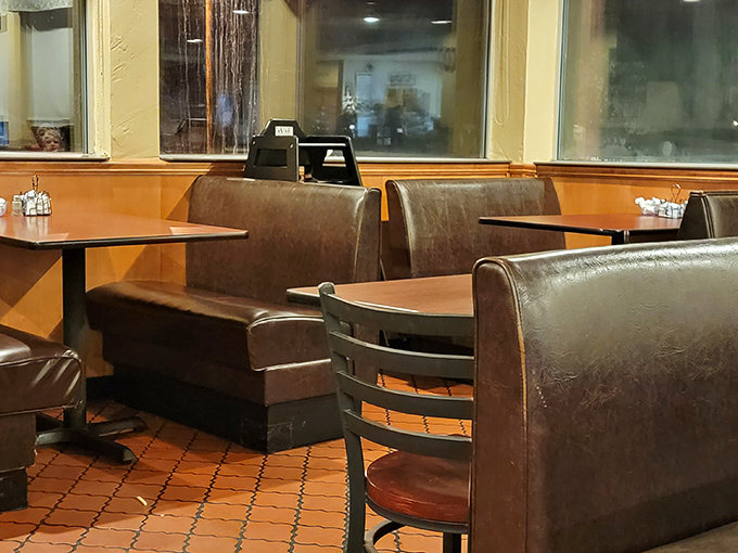 Those brown leather booths have heard decades of local gossip, family celebrations, and the satisfied sighs of well-fed customers.