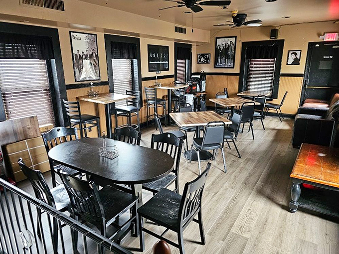 Rock legends watch over diners from the walls, as if even they would trade a stadium show for one more bite of these legendary sandwiches.