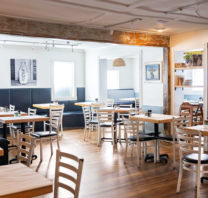 Clean lines, wooden floors, and the promise of breakfast magic. The dining room practically whispers, "Stay awhile."