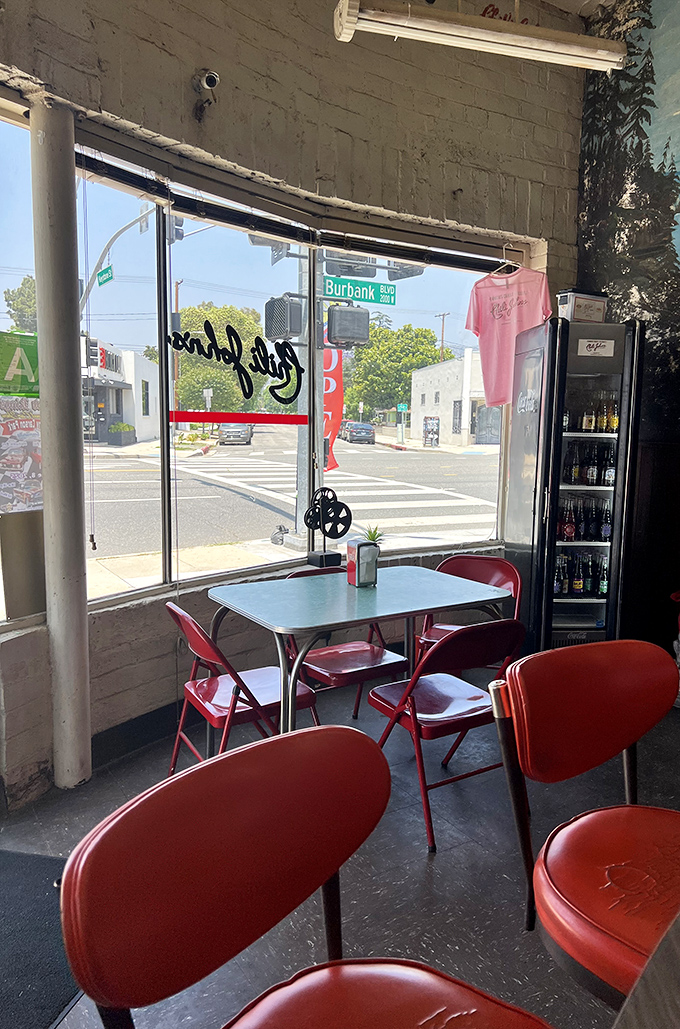 The view from these window seats offers prime people-watching with a side of nostalgia and the comforting red vinyl that's hosted thousands before you.
