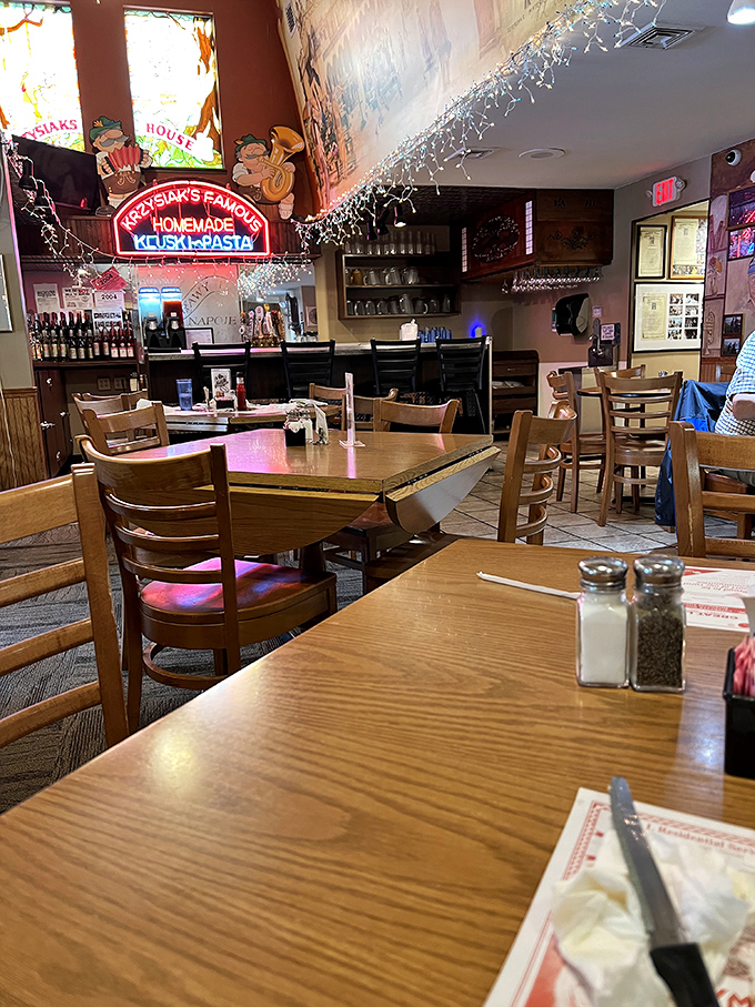 The dining area where neon signs and wood tables create that perfect "fancy enough for Sunday dinner, casual enough for Tuesday lunch" vibe.
