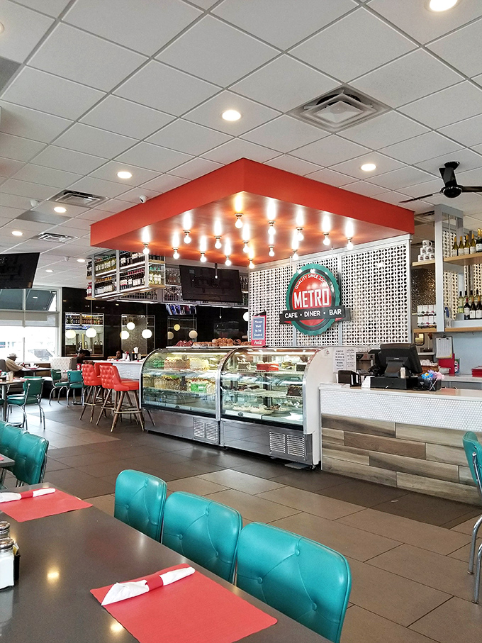 The dessert counter commands attention under the iconic Metro sign, where calories don't count and diet plans come to die happy deaths.