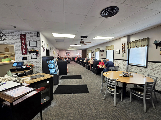 The counter seating creates an intimate community where strangers become friends over shared plates of morning magic.