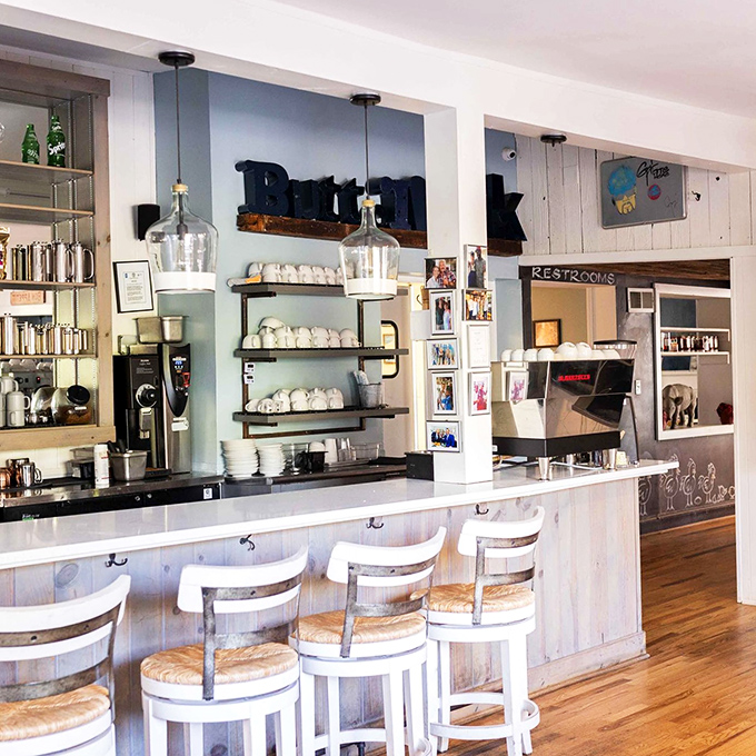 The counter seating area combines farmhouse charm with coffee bar efficiency&mdash;the breakfast equivalent of business in front, party in back.