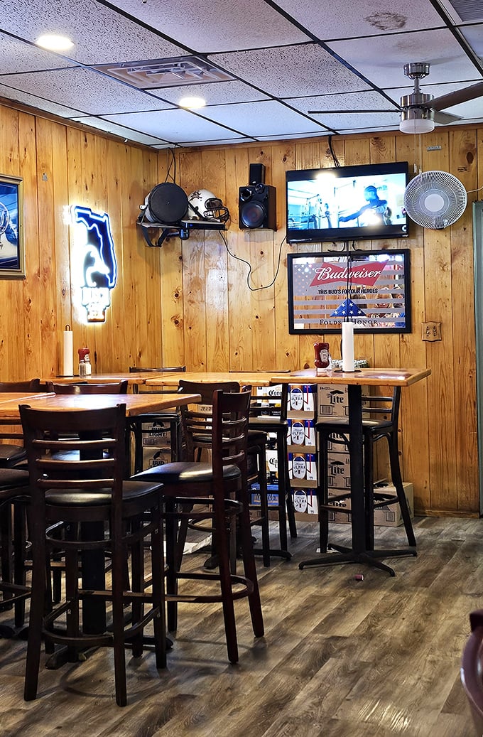 High-top tables, wood paneling, and beer signs – where "rustic chic" isn't a designer concept but just how things naturally turned out.