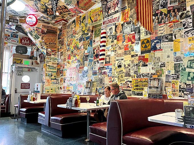 Every surface tells a story in this diner, where vintage advertisements and memorabilia create a museum you can eat in.