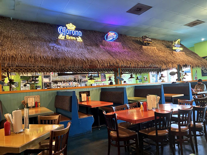 The thatched tiki bar brings beach vibes indoors, proving paradise isn't a place&mdash;it's wherever you're eating a perfect burger.