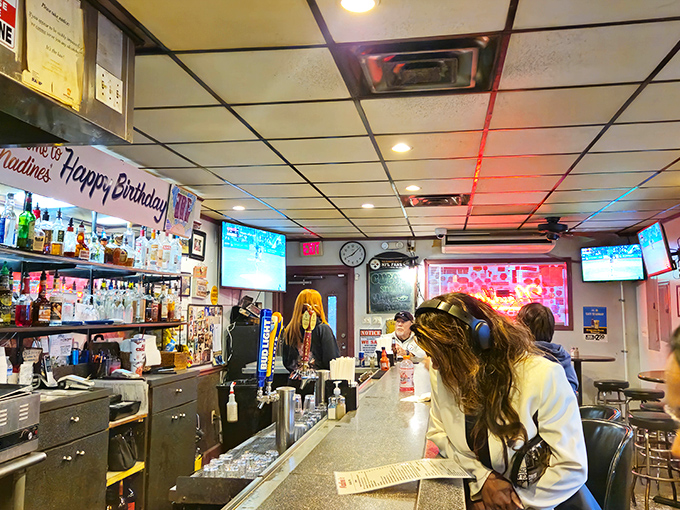 The bar at Nadine's isn't just where drinks are served &ndash; it's where neighborhood stories are exchanged, debated, and occasionally improved upon.