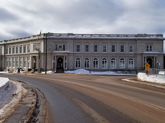 The Ironwood Memorial Building stands snow-surrounded and stately, like a government building that actually wants to be photographed.
