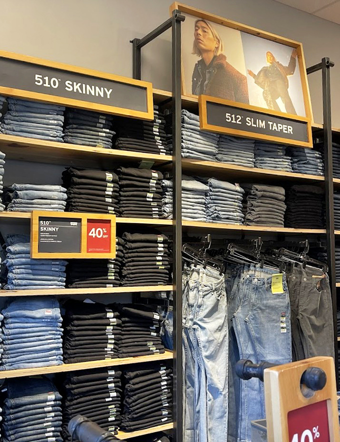 Denim displayed with military precision, each pair promising to be "the one" that finally fits perfectly in all the right places.