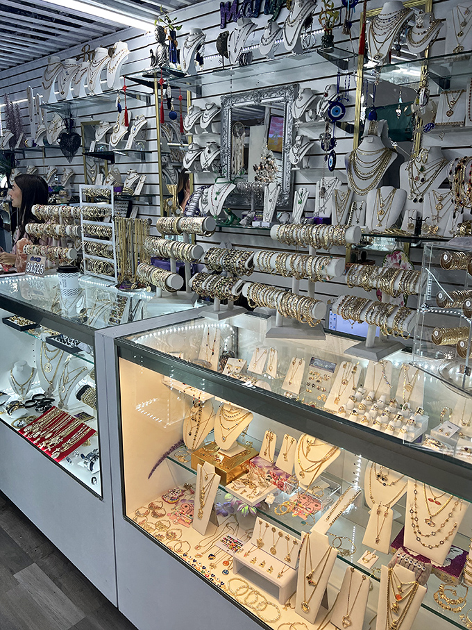 Jewelry displays that would make Aladdin's cave of wonders look understocked. Every surface sparkles with potential birthday presents, anniversary gifts, or "just because" treasures.