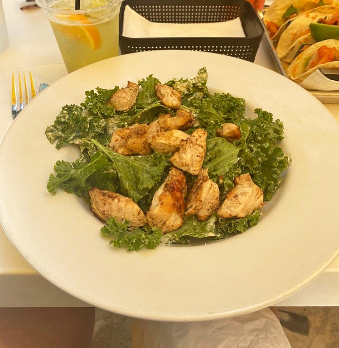 The Kale Caesar proves that healthy eating doesn't mean punishment&mdash;tender greens and perfectly seasoned chicken create a salad worth crossing state lines for.