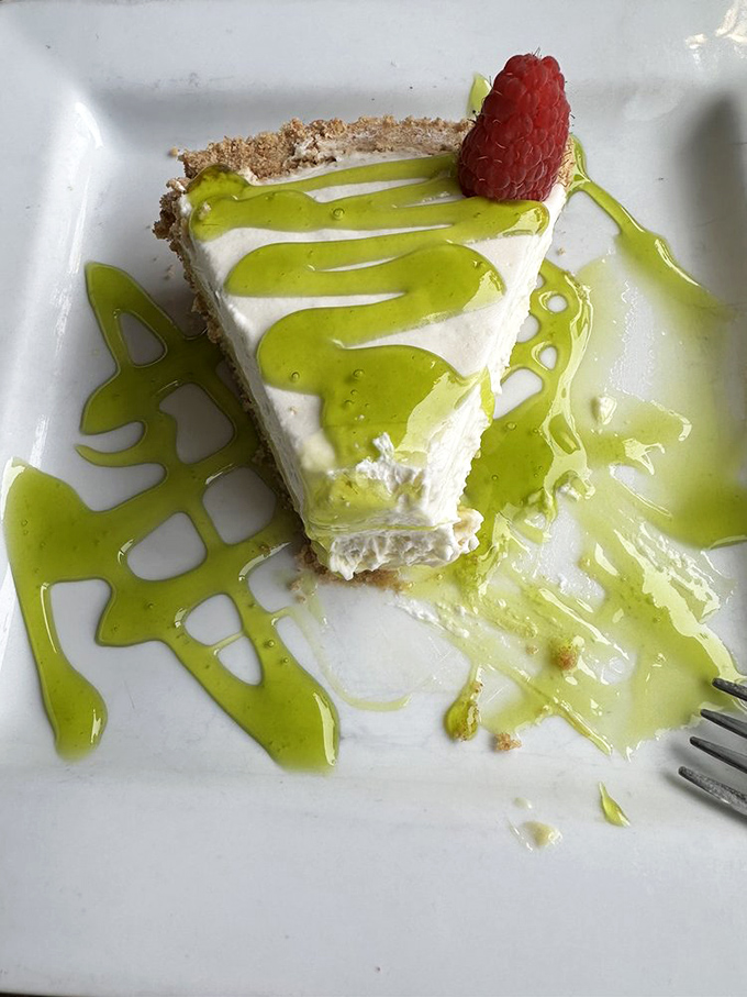 Key lime pie that finds the perfect balance between sweet and tart. That raspberry on top isn't just garnish&mdash;it's the cherry on top that isn't a cherry.