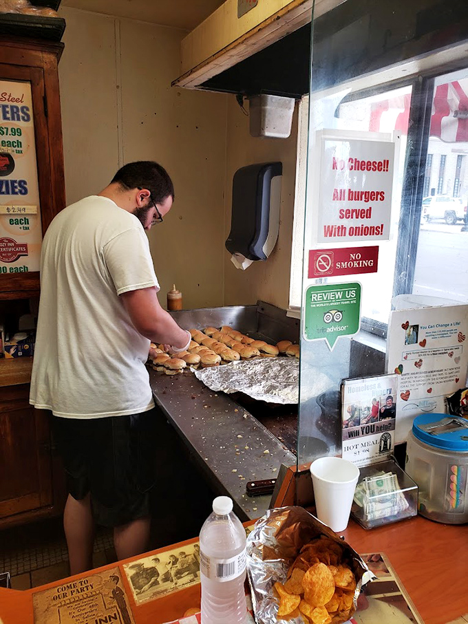 Behind the scenes where the magic happens&mdash;dozens of sliders in formation, awaiting their destiny on a well-seasoned grill.