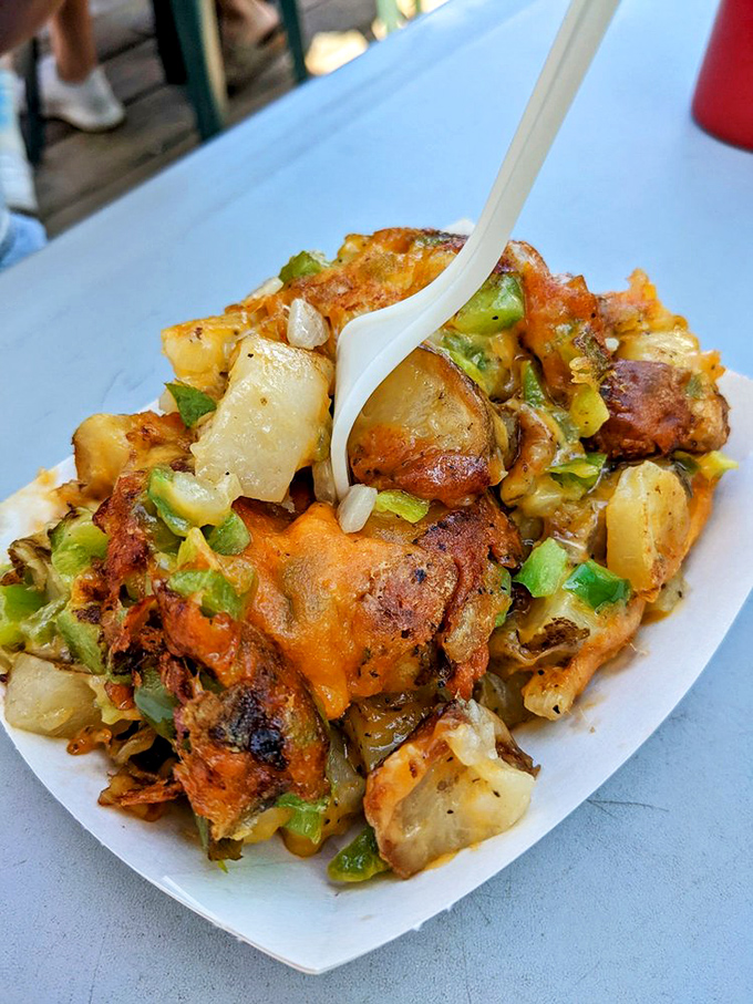Kono's Potatoes aren't just a side dish, they're the main event&mdash;a glorious jumble of spuds, cheese, and peppers that might make you forget about the rest of your meal.