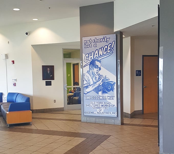 Not charity but a CHANCE! The Goodwill philosophy displayed proudly, reminding shoppers their purchases support job training and community programs.