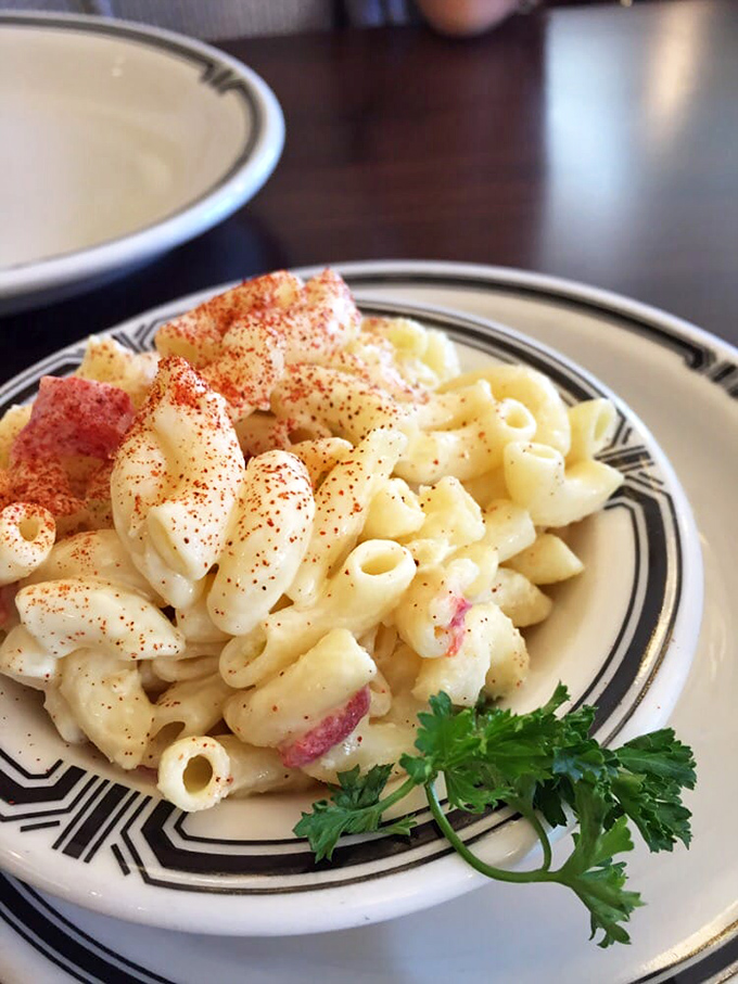 Mac and cheese that looks like it's been touched by angels. That dusting of paprika isn't just garnish&mdash;it's a promise.