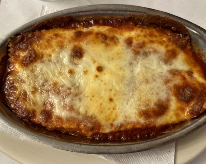 Manicotti that makes you question all other pasta experiences. That golden-brown cheese top is nature's perfect food seal.