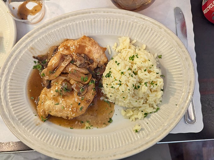 Chicken marsala with mushrooms swimming in a sauce so good you'll be tempted to drink it like a fine wine.