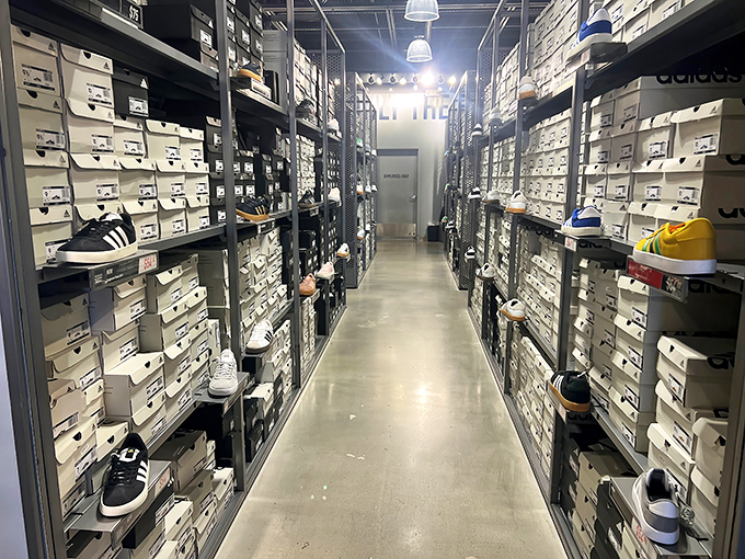 The sneaker vault &ndash; where Adidas boxes stack like a temple to athleisure and finding your size feels like winning a small lottery.