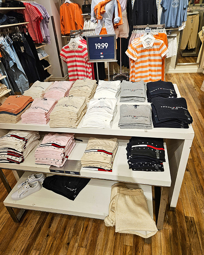 Tommy Hilfiger's display is a masterclass in color coordination and temptation. That $19.99 price tag is practically begging you to rebuild your wardrobe.